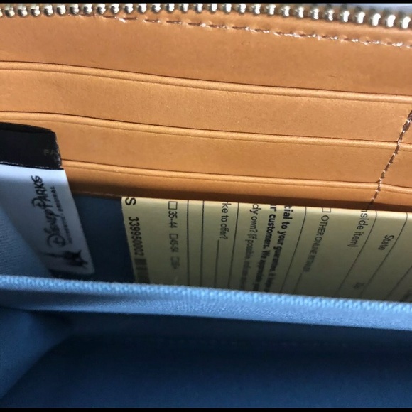 Dooney & Bourke | Bags | Disneys Its A Small World Wallet By Dooney Bou ...